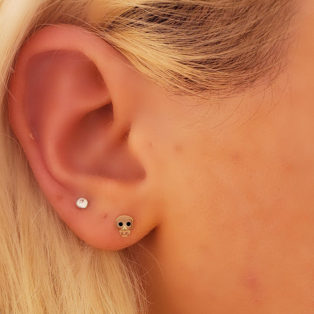 gold skull studs